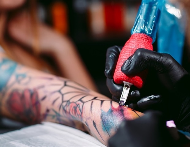 Microneedle technology for low-cost, painless, and bloodless tattoos